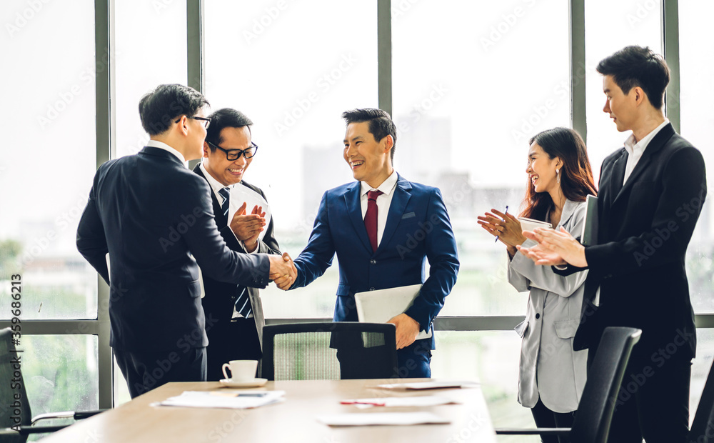 Image two asian business partners in elegant suit successful handshake ...