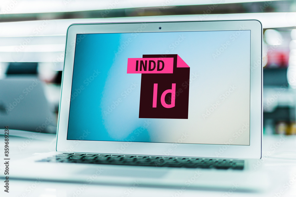 Laptop computer displaying logo of Adobe InDesign Stock Photo | Adobe Stock