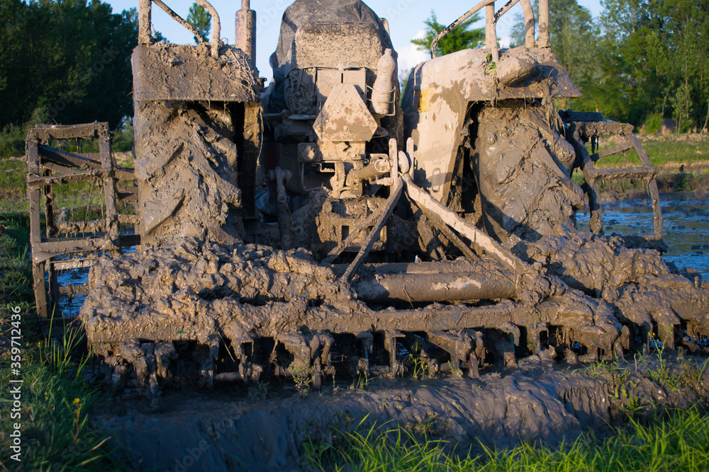 a farmer ploughing land for crop cultivation. making land ready for ...