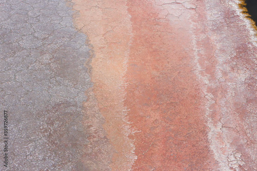 Aerial view of the salt pan and mineral crust with red algae of Lake ...
