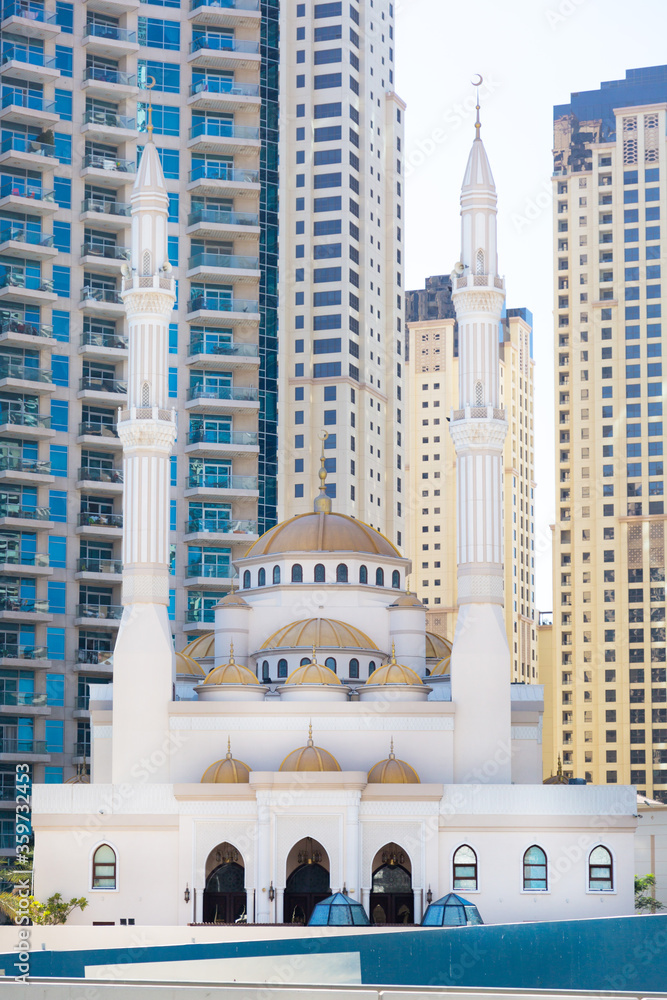 White muslim mosque in the city center. The White Mosque is surrounded ...