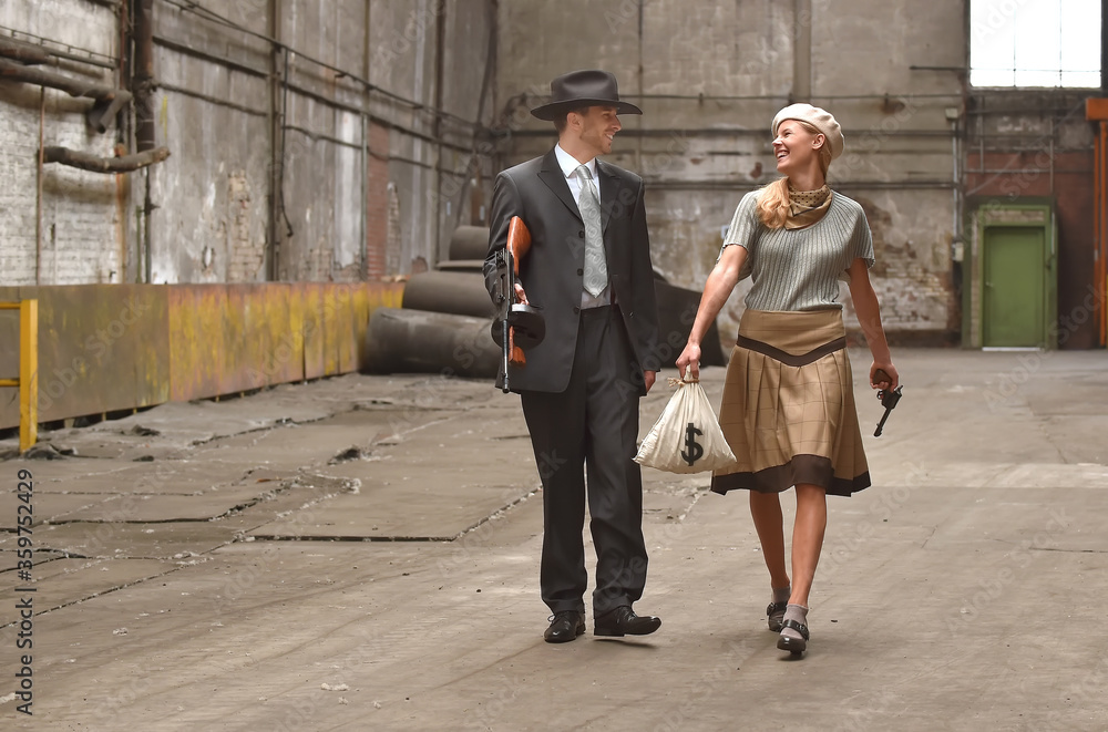 Two models get dressed up in 1930's style vintage clothing and act the ...