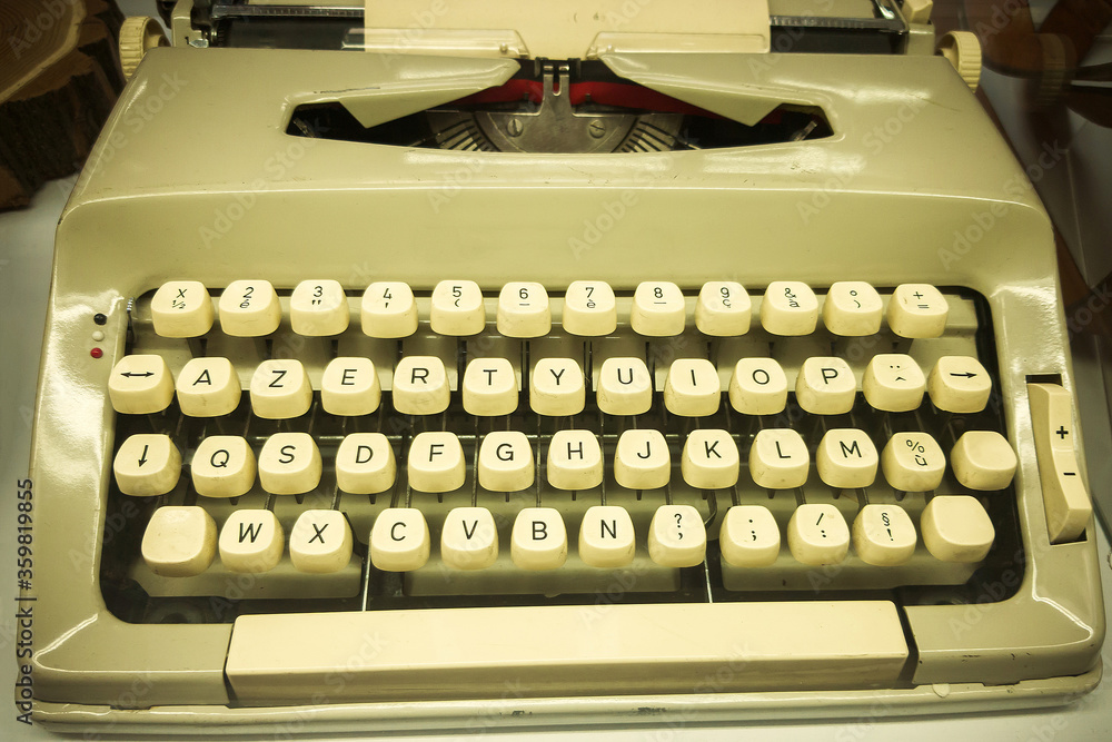 Old mechanical typewriter with a sheet for printing in a museum of an ...