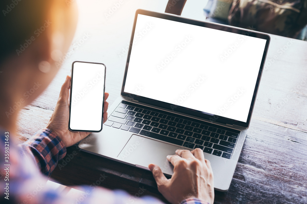 computer,cell phone mockup image.hand woman work using laptop texting ...