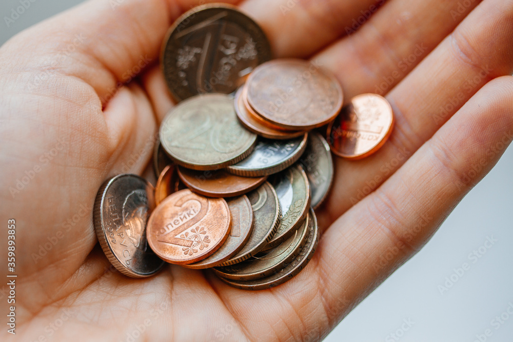 Silver coins in hands, cash payments and settlements Stock Photo ...