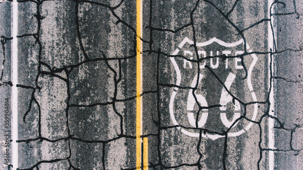 Bird’s eye view of painted on cracked asphalt roadside number sign of ...