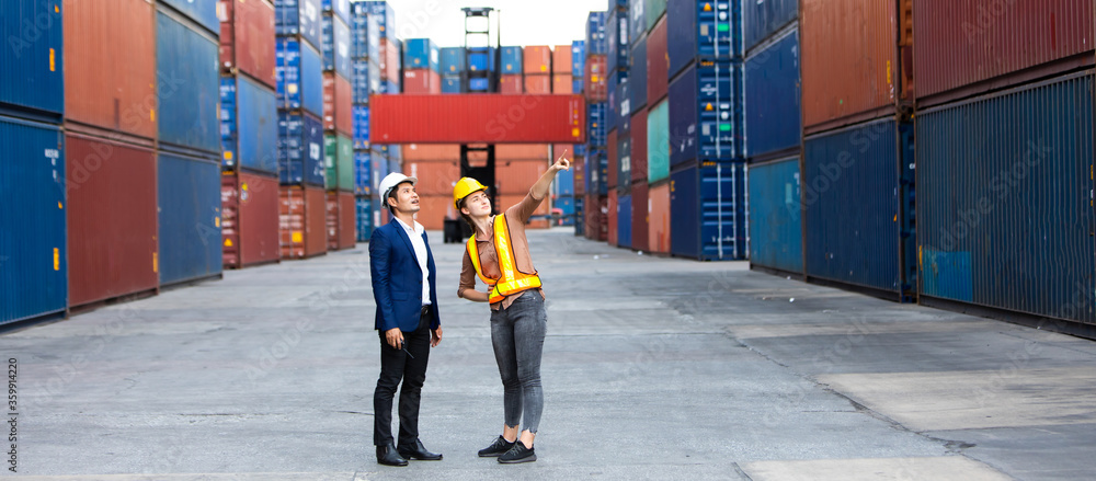 Man manager and woman Supervisor dock cargo checking and control ...