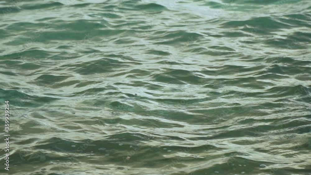 Static background footage of ocean surface with gentle waves and ...
