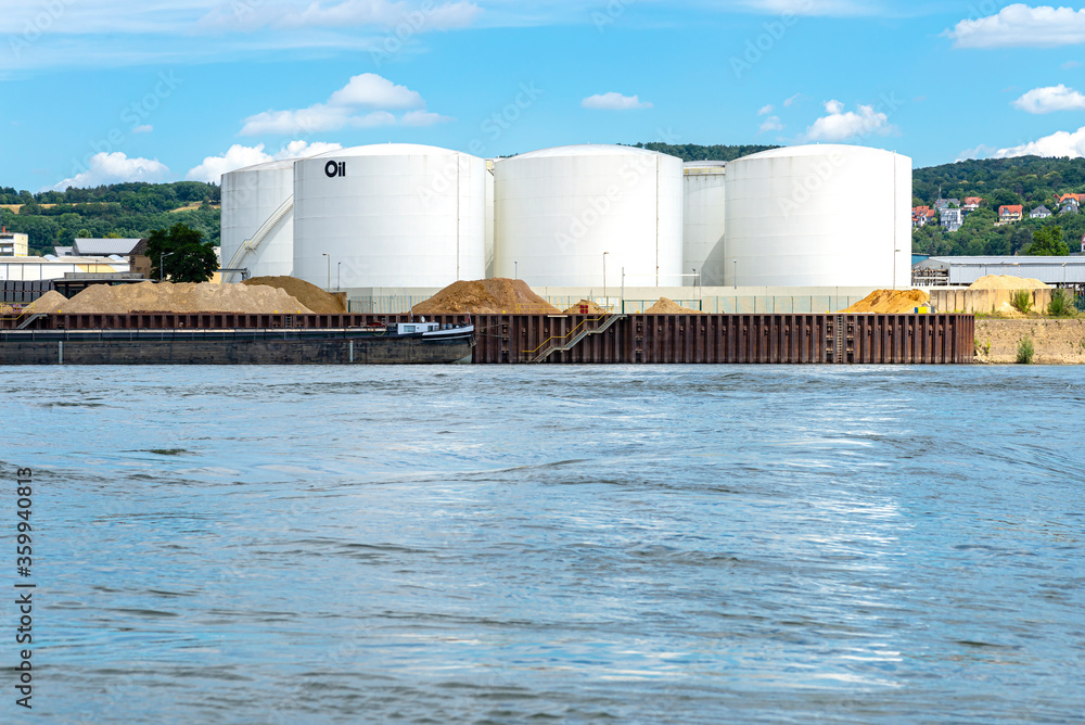 Storage silos, fuel depot of petroleum and gasoline on the banks of the ...