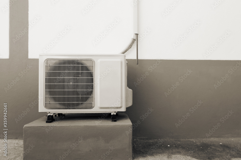 show position of Air conditioner installed outside of home with cement ...