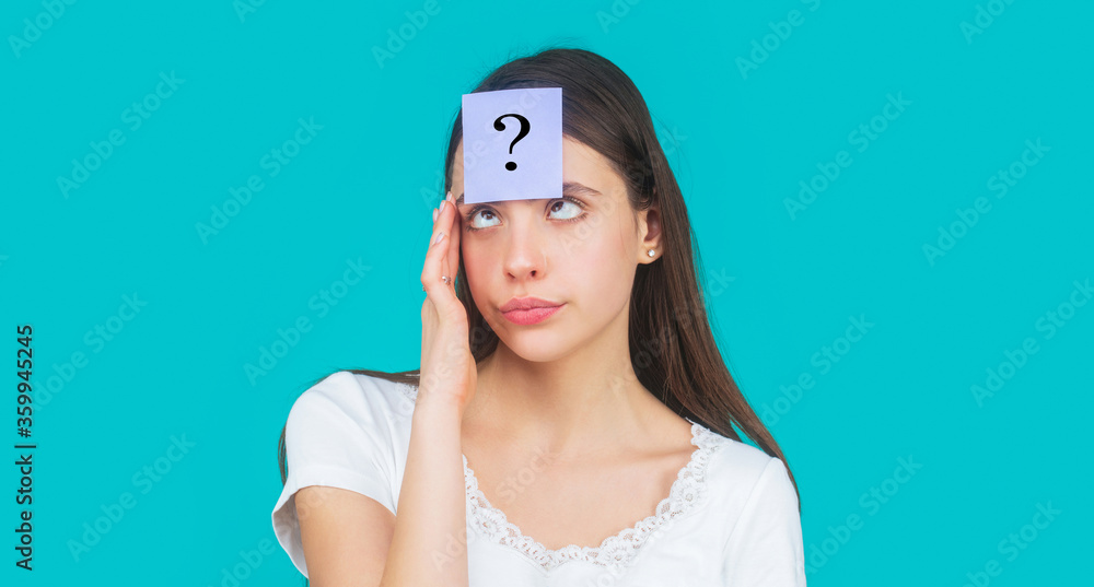 Paper notes with question marks. Doubtful girl asking questions to ...