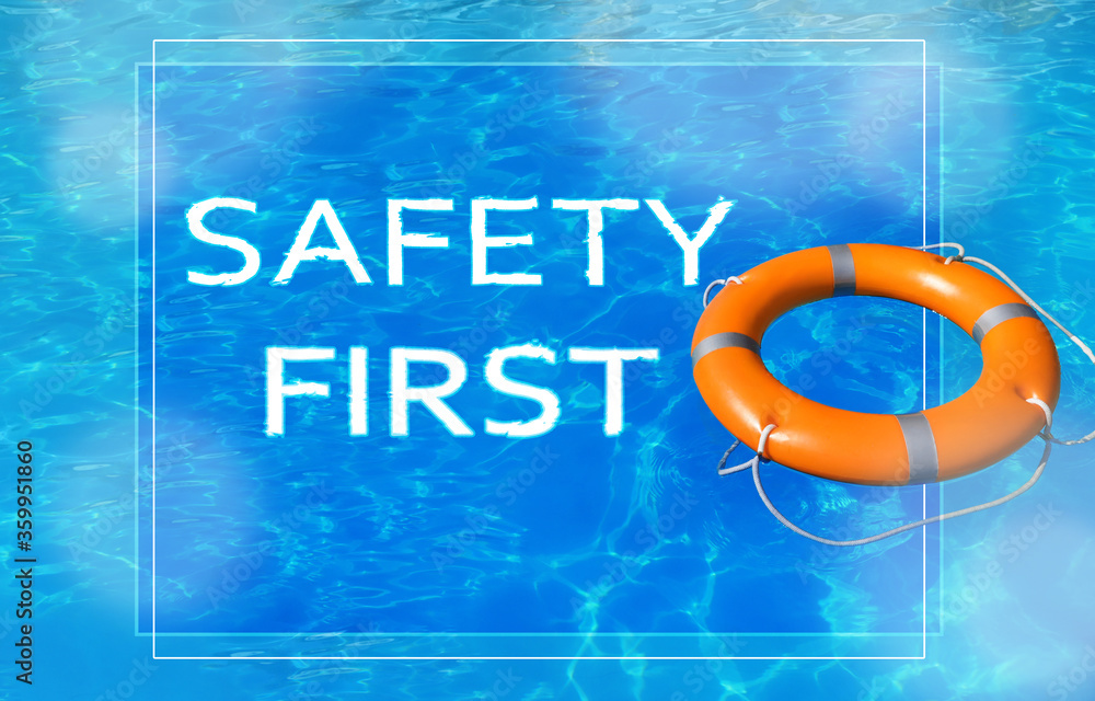 Safety first. Life buoy in swimming pool with clean blue water Stock ...