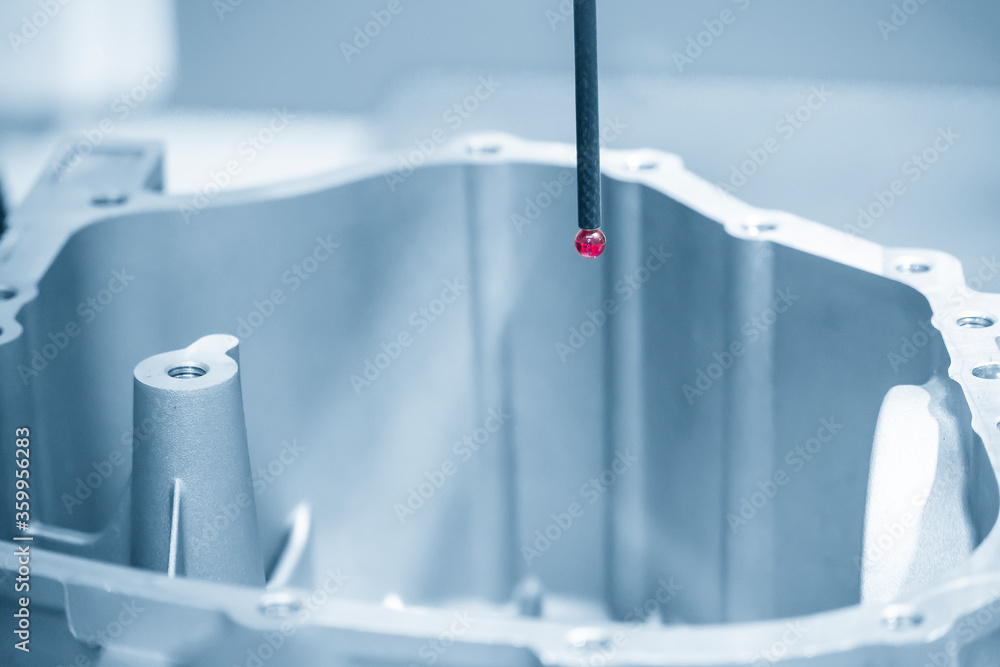 The CMM machine measuring the aluminium casting parts by touching probe ...