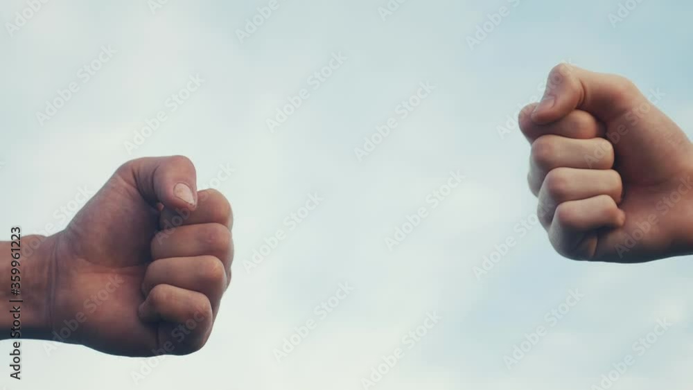 teamwork concept. fist to fist commit solidarity respect and ...