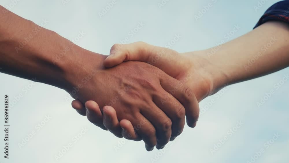 teamwork handshake concept. two people shake hands shaking hands ...