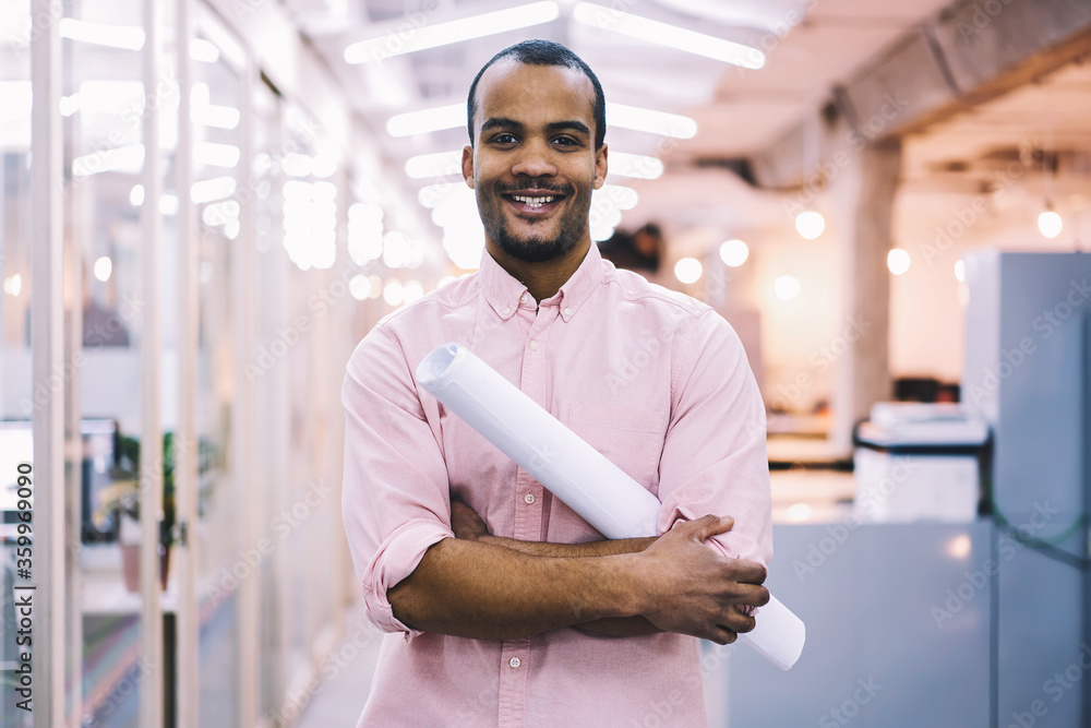 Smiling portrait of handsome male student architect feeling happy about ...