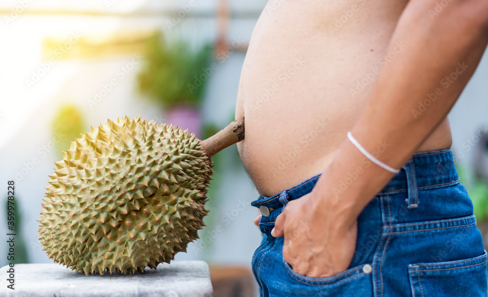 Durian is the king of fruit, placed beside the undressed man ...