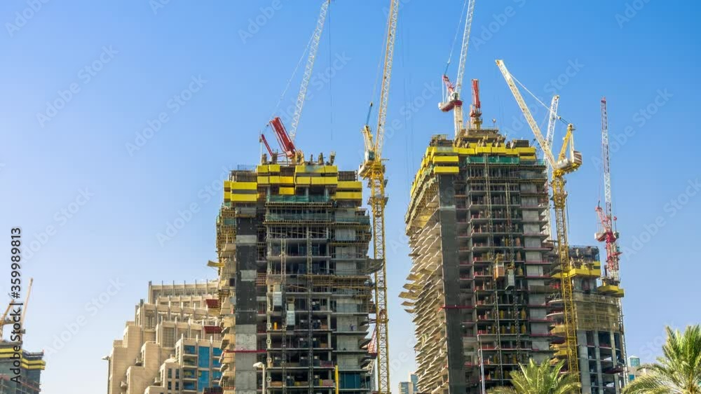 Construction site in Dubai downtown, United Arab Emirates, with many ...