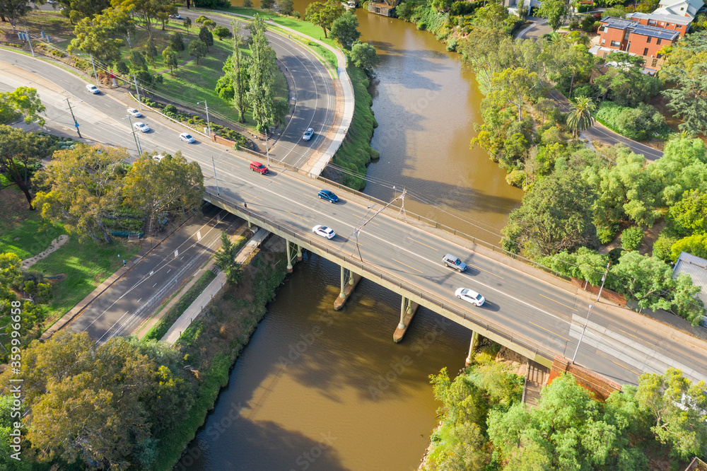 Aerial view of traffic crossing on and under bridge over an inner city ...