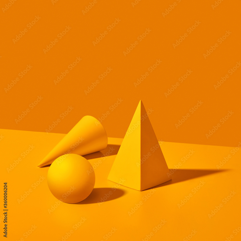 Plaster geometric shapes on a yellow background. Stock Photo | Adobe Stock