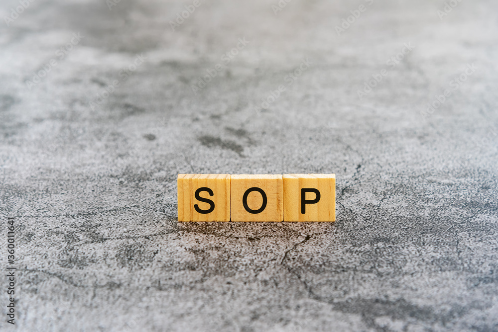 SOP (Standard Operating Procedure) text on wooden block textures ...