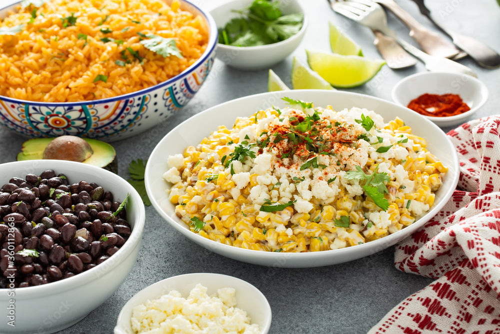 Mexican street corn, elote with cotija cheese, fresh cilantro and chili ...