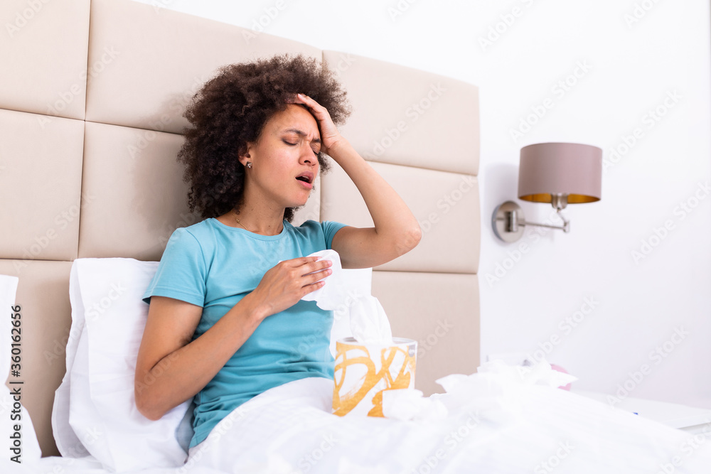 Sick day at home. Young woman has runny and common cold. Cough. Closeup ...