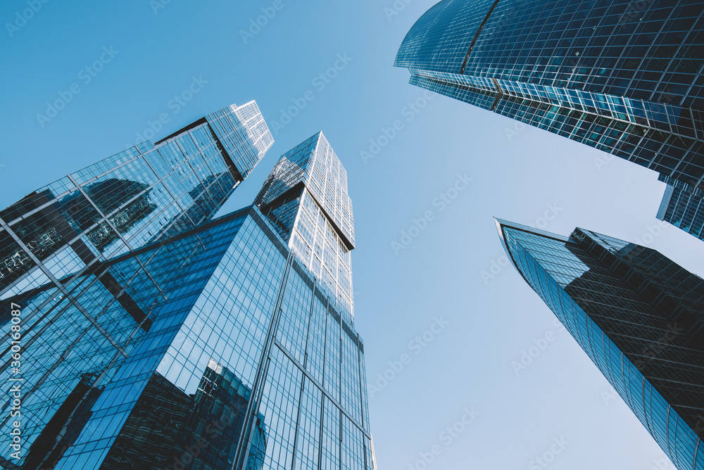 View from below of a shining modern office buildings in new district ...