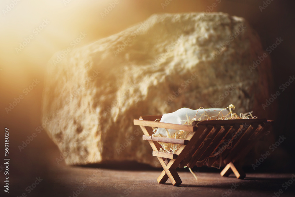 Wooden manger and star of Bethlehem in cave, nativity scene background ...