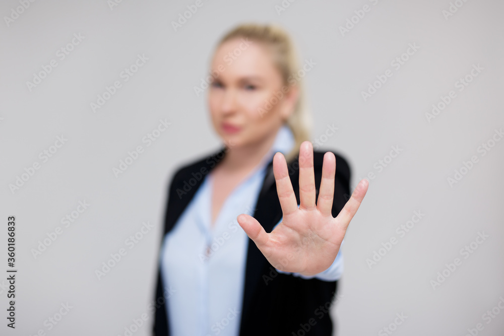 young beautiful plus size blonde woman in black business suit showing ...