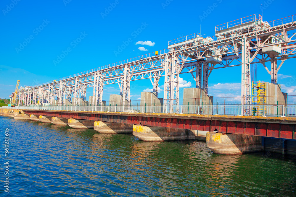 hydroelectric power plant with rotating turbines Stock Photo | Adobe Stock