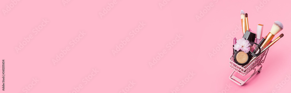 Cosmetic products on pink background. Horizontal web banner with copy ...