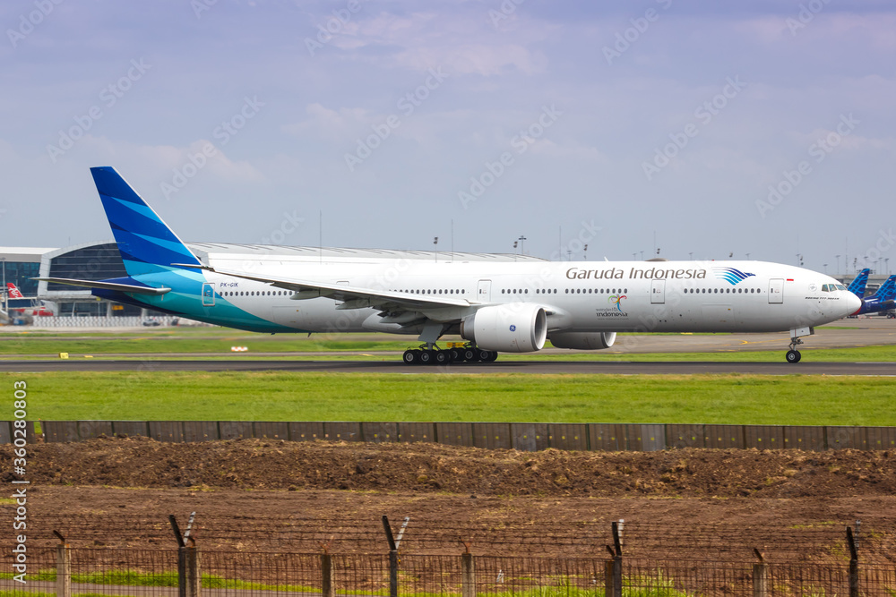 Garuda Indonesia Boeing 777-300 airplane at Jakarta airport Stock Photo ...