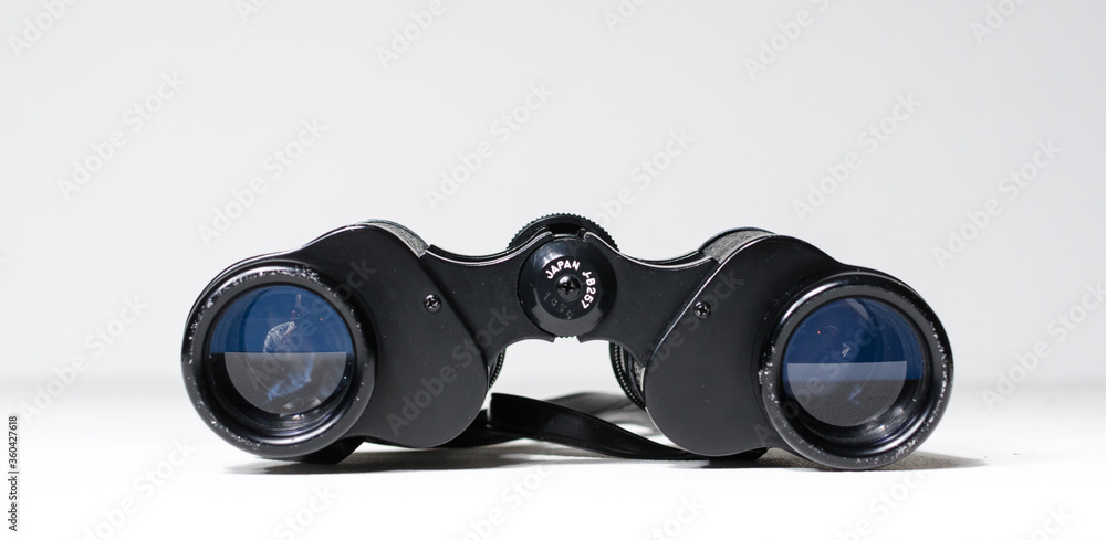 A set of vintage old antique binoculars on a white background. Vintage ...
