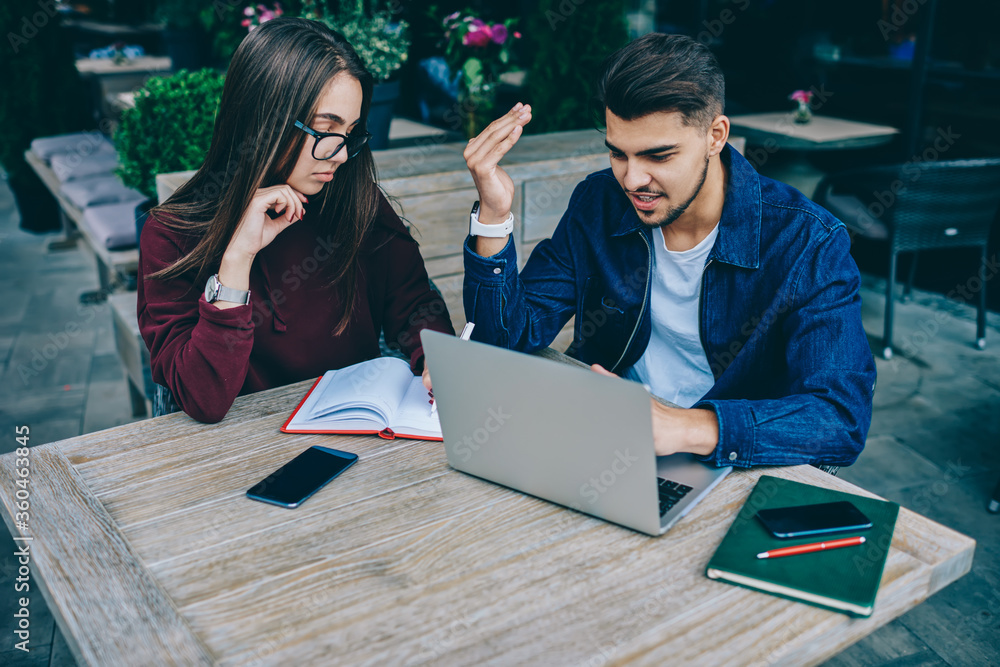 Emotional hipster guy upset with software failure on laptop computer ...