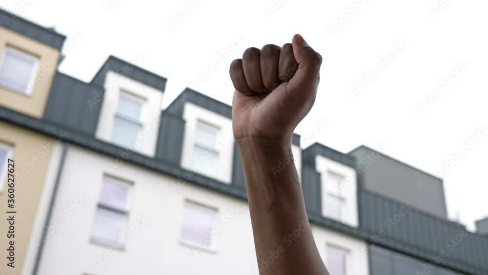 Video „The raised fist or the clenched fist is a hand gesture symbol of ...