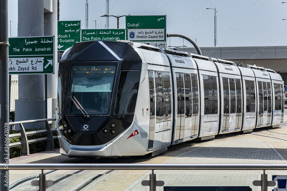 View of Dubai Tram. Dubai Tram runs in a loop around Marina and JBR ...