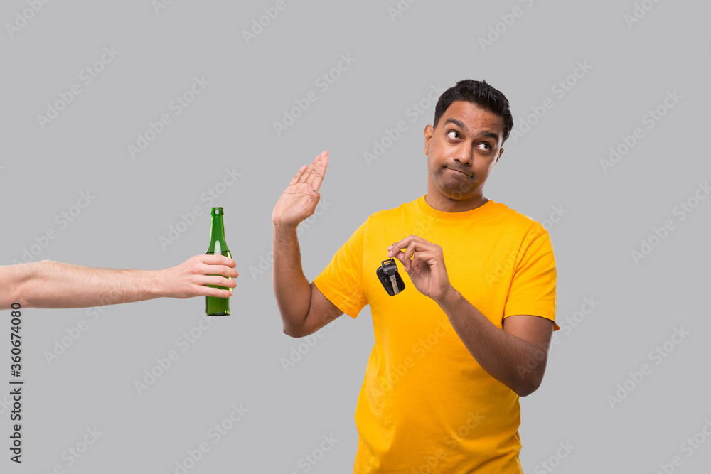 Indian man Saying No to Beer bottle Holding car Keys. Dont Drink and ...