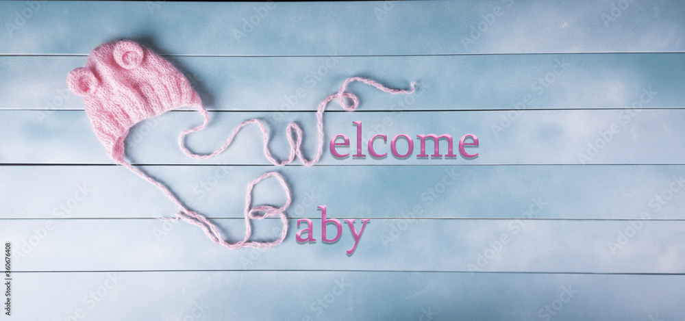 Welcome baby girl on wood background. Baby shower, birthday, invitation ...