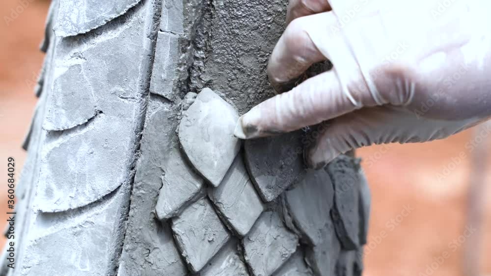 Vídeo do Stock: Sculptor create Cement mortar model of with scrolls and ...