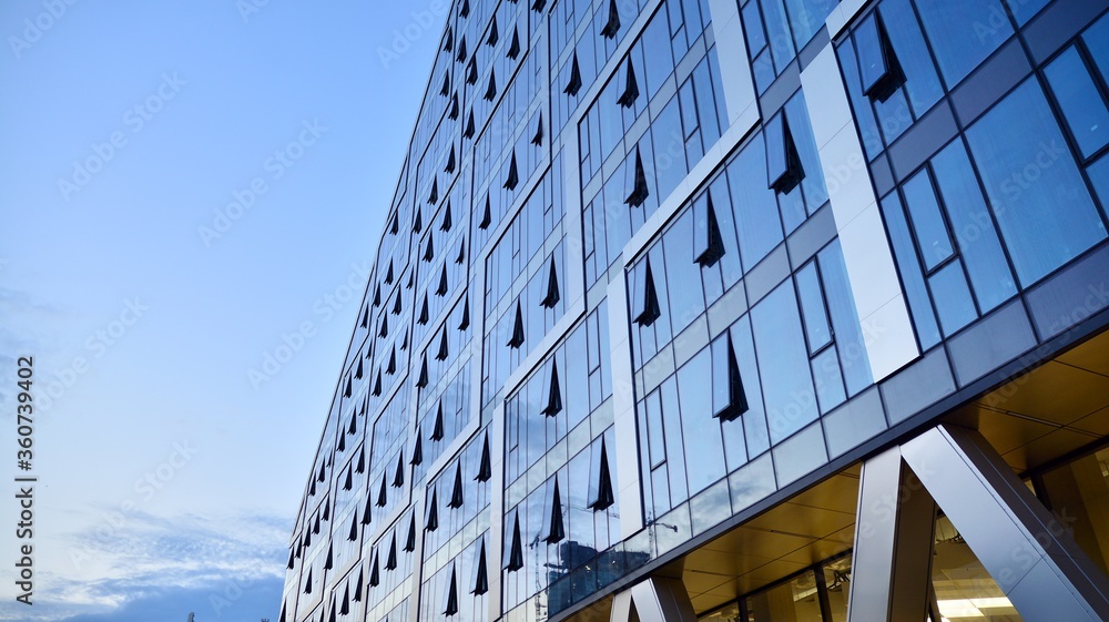 Facade texture of a glass mirrored office building. Fragment of the ...