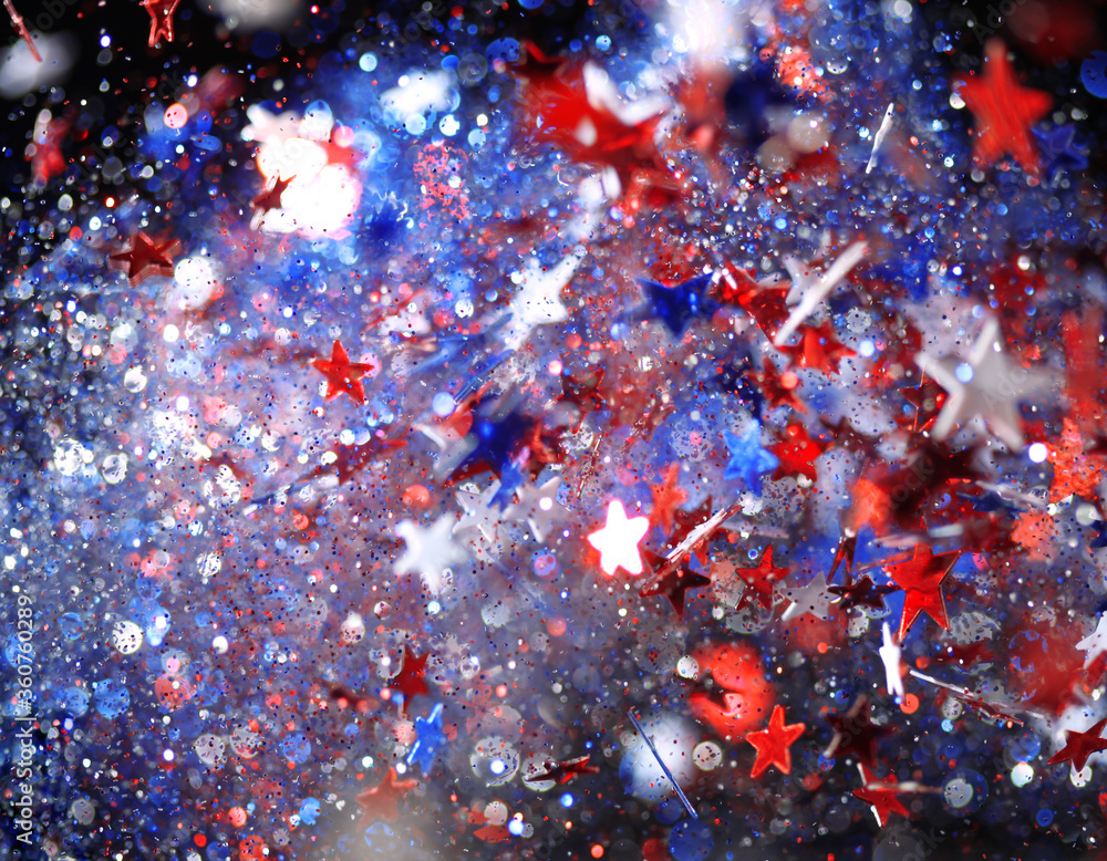 Background of red, white, and blue sparkling glitter scattered with ...