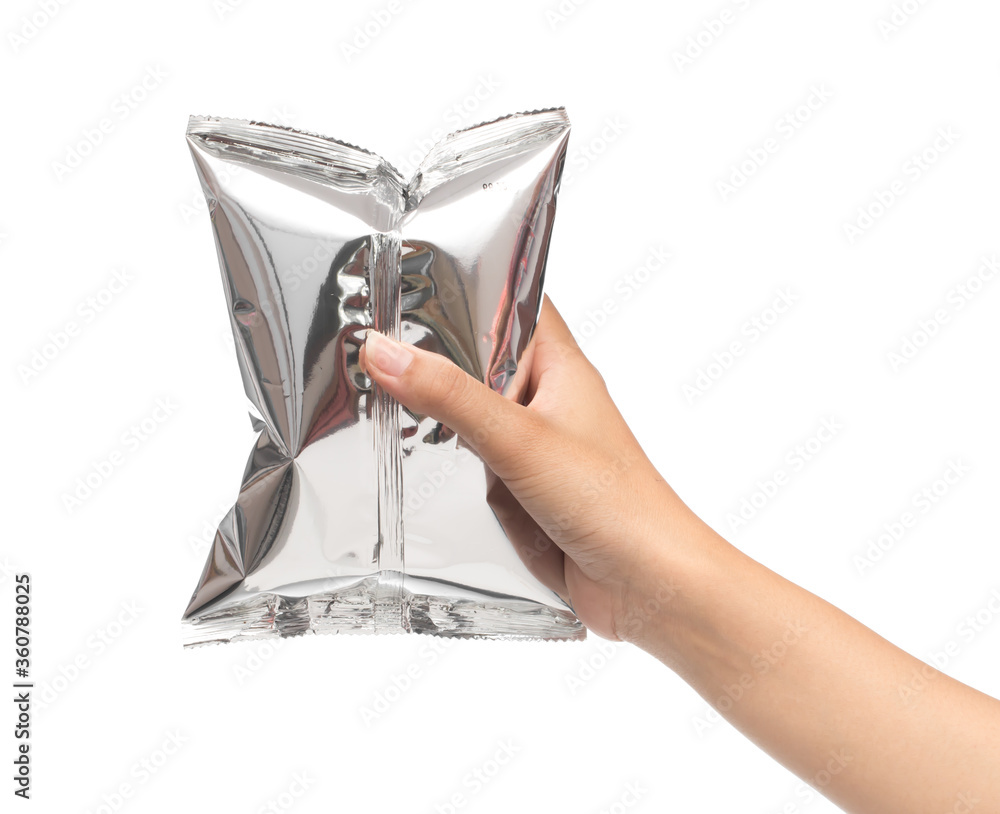 hand holding plastic bag snack packaging isolated on white background ...