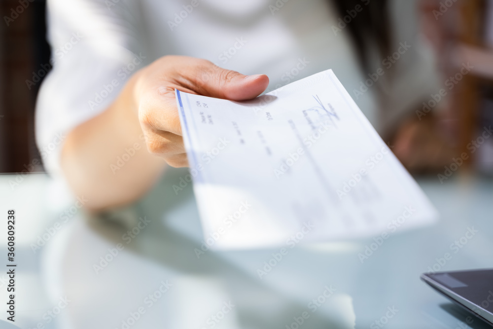Hand Giving Payroll Compensation Paycheck Stock Photo | Adobe Stock