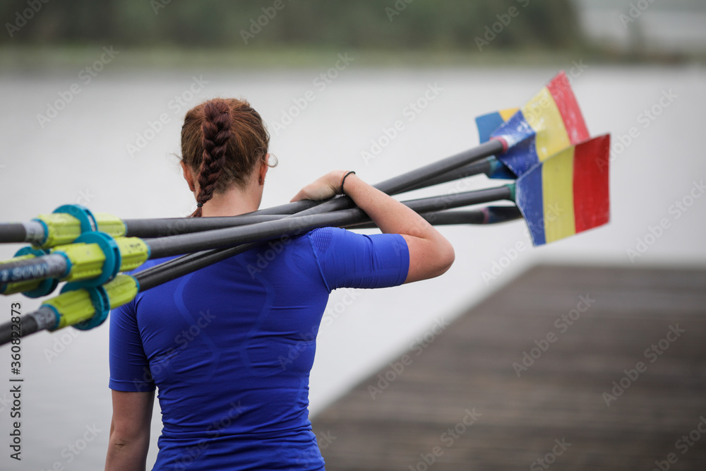 Romanian professional women rowers from the Olympic Team train in a ...