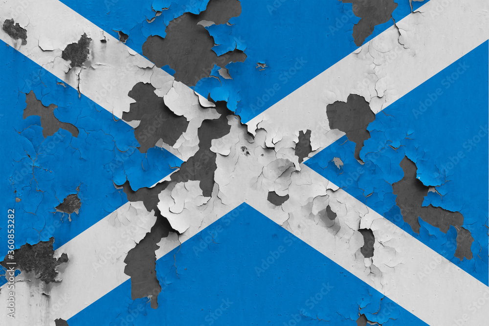 Scotland flag close up painted, damaged and dirty on wall peeling off ...