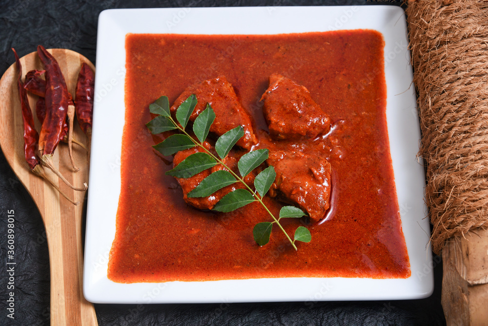 Kerala red fish curry is a hot and spicy seafood cuisine masala gravy ...