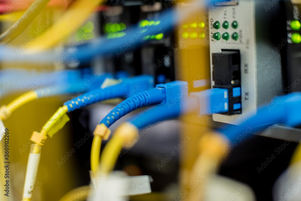 Server room with computers for internet. Network cables connected to ...