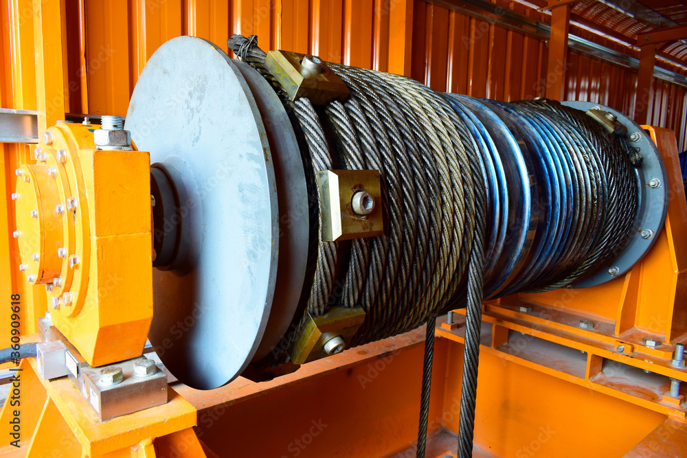 Wire rope sling or cable sling on crane reel drum or winch roll of ...
