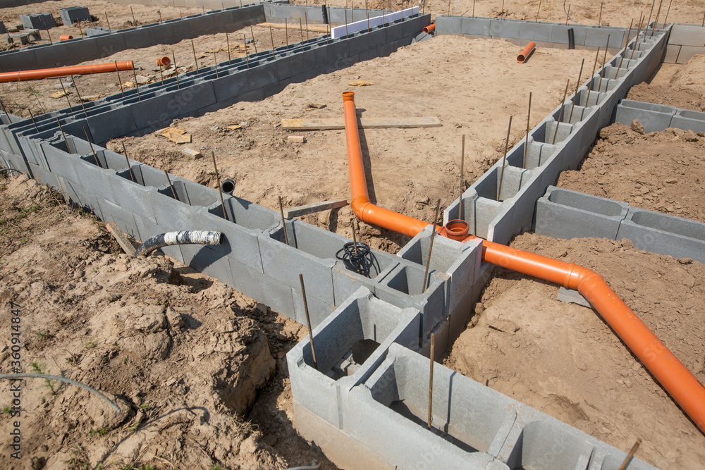 Foundations of the house, unfinished bungalow, rough construction ...
